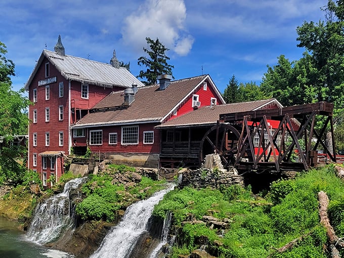 The iconic red mill perched above cascading waterfalls isn't just Instagram bait&mdash;it's a 200-year-old testament to when breakfast came with a side of history.