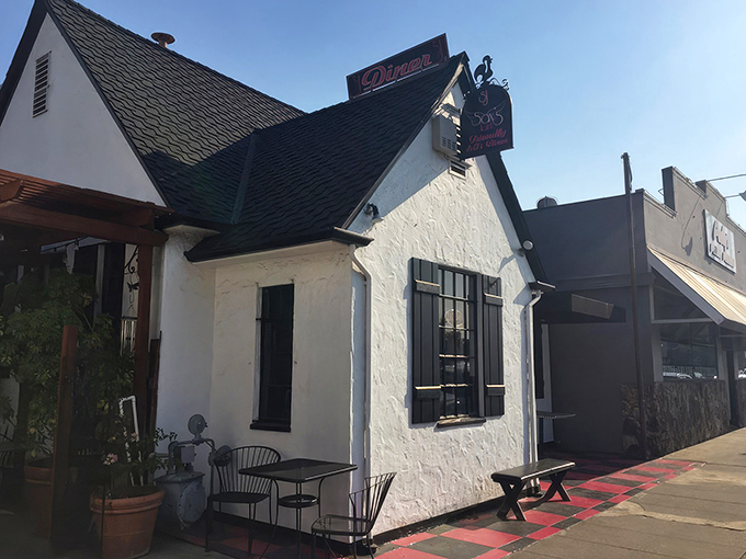 The pink door at Sax's Joint isn't just an entrance&mdash;it's a portal to comfort food nirvana. The checkerboard patio practically screams "good times ahead!"