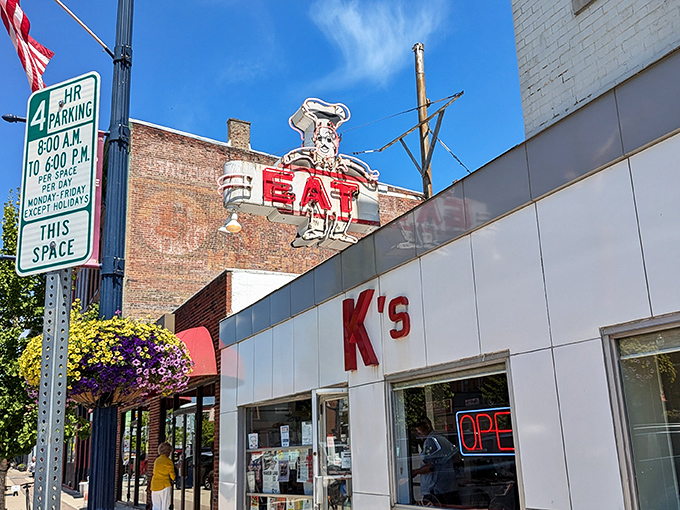 The iconic K's storefront beckons with its vintage "EAT" sign &ndash; a neon command that's impossible to ignore and even harder to disobey.