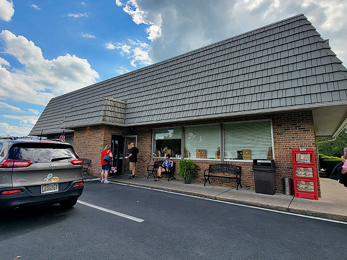 The humble brick exterior of Katie's Kitchen hides culinary treasures inside, like finding a pearl in an unassuming oyster. That Amish figure seems to say, "You're in for something special."