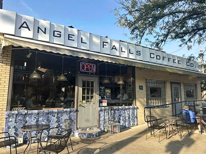 The welcoming storefront of Angel Falls beckons like an oasis in Highland Square, promising caffeinated salvation and pastry-based happiness to weary travelers.