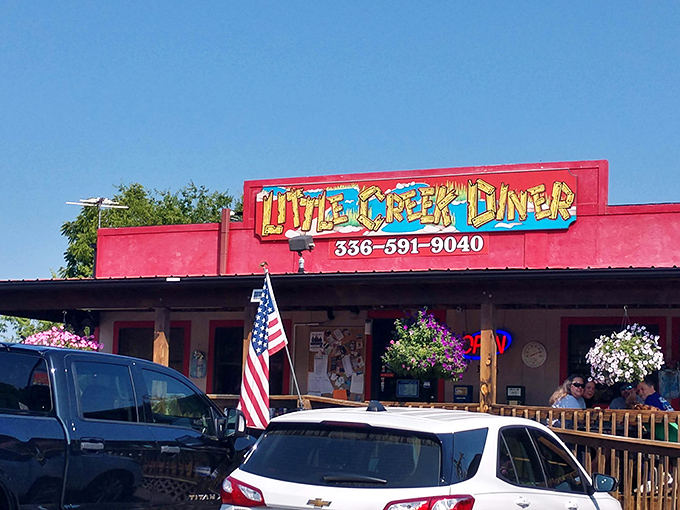 The unassuming exterior of Little Creek Diner proves once again that culinary greatness rarely comes with neon signs and valet parking.