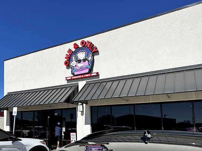 The unassuming storefront might not stop traffic, but that cartoon chef with sunglasses knows something you don't yet &ndash; burger nirvana awaits inside.