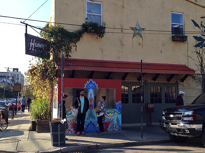 That weathered wooden sign against the yellow building isn't just decoration&mdash;it's a beacon for breakfast pilgrims seeking Philadelphia's comfort food promised land.