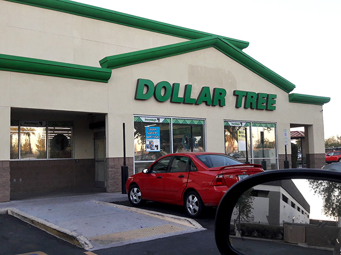 The iconic green-trimmed facade of Dollar Tree on Baseline Road stands like a beacon of bargains in the Arizona sun.