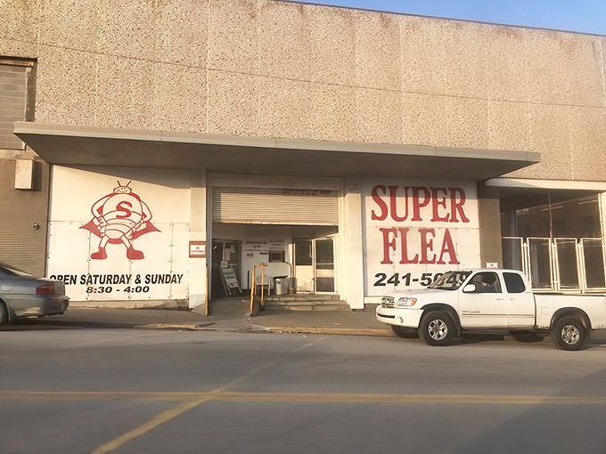The iconic Super Flea entrance beckons bargain hunters with its no-frills charm and cartoon mascot—like a siren call for treasure seekers everywhere.