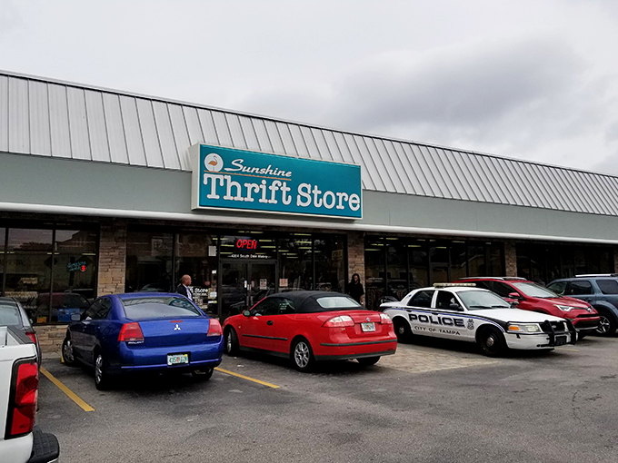 The turquoise sign beckons like a siren call to bargain hunters. Even the Tampa police can't resist stopping by for some thrifty treasure hunting.