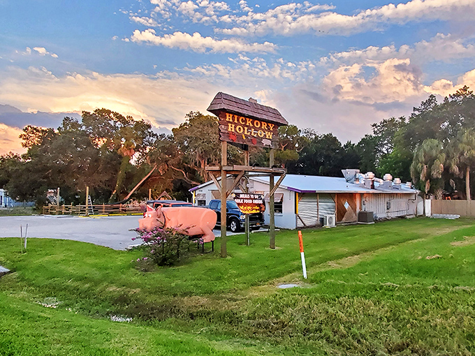 The unassuming exterior of Hickory Hollow might fool you, but true BBQ wisdom teaches us that the plainest buildings often hide the most extraordinary flavors. 