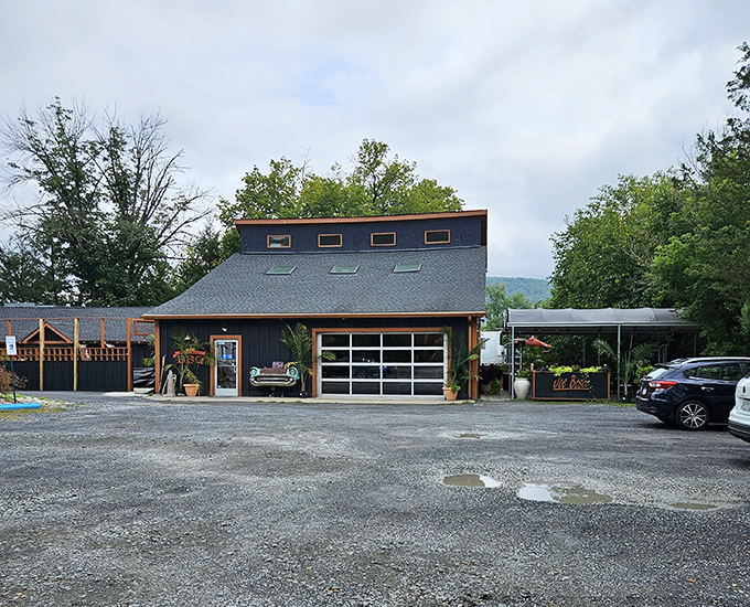 The classic car front boldly mounted on this blue-gray exterior isn't just decoration&mdash;it's a promise that something timelessly delicious awaits inside.