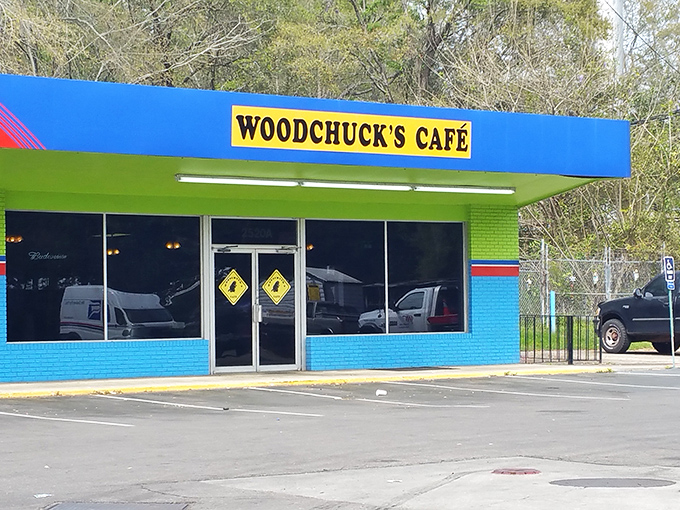 That bright blue and green exterior isn't trying to blend in – it's announcing something special awaits inside.