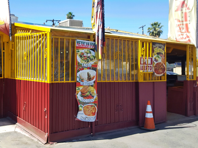 The unassuming yellow and burgundy exterior of Grandma's Tamales stands like a beacon of culinary promise on a Bakersfield corner. Treasure isn't always hidden in fancy packaging.