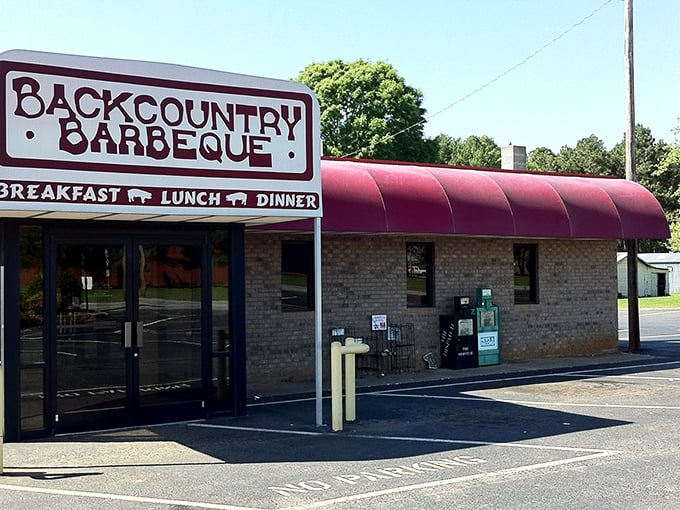 That pink awning isn't just a roof – it's a beacon of barbecue hope on Old Linwood Road, guiding hungry pilgrims to smoky salvation.