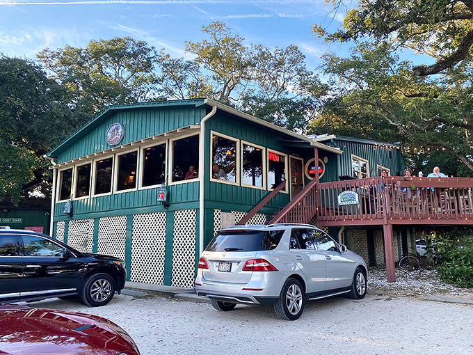 The unassuming wooden sign at Russell's Seafood Grill promises no frills, just seafood excellence. Like finding buried treasure without needing a fancy map.