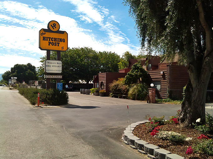 The iconic yellow sign beckons hungry travelers like a lighthouse for meat lovers. Buellton's roadside treasure promises oak-fired delights within those rustic walls.