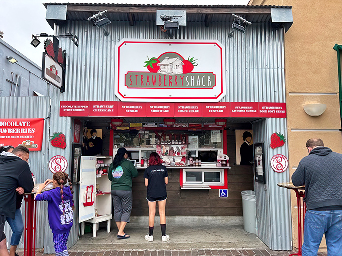 The Strawberry Shack's corrugated metal exterior proves that paradise doesn't need marble columns &ndash; just fresh berries and happy customers.
