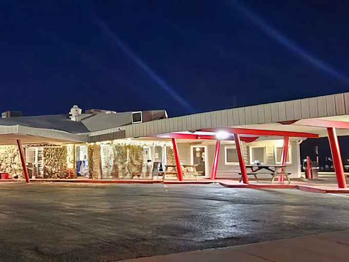 Classic drive-in charm meets modern convenience under these iconic red canopies that promise good times ahead.