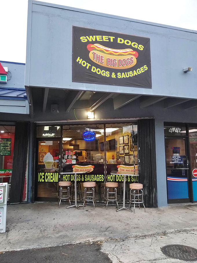 The coral-colored beacon of hot dog heaven stands proudly on a Miami street, promising frankfurter fantasies that'll make your taste buds do the salsa.