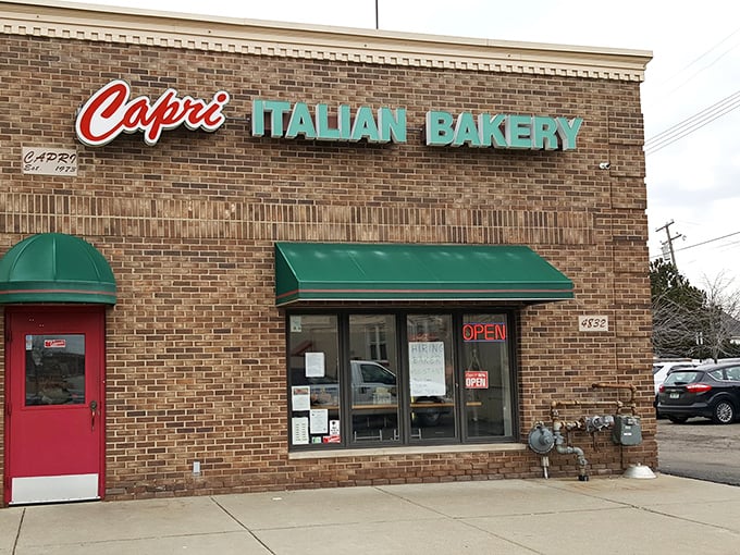 The unassuming brick exterior of Capri Italian Bakery hides culinary treasures that would make even the most discerning Italian grandmother nod in approval.