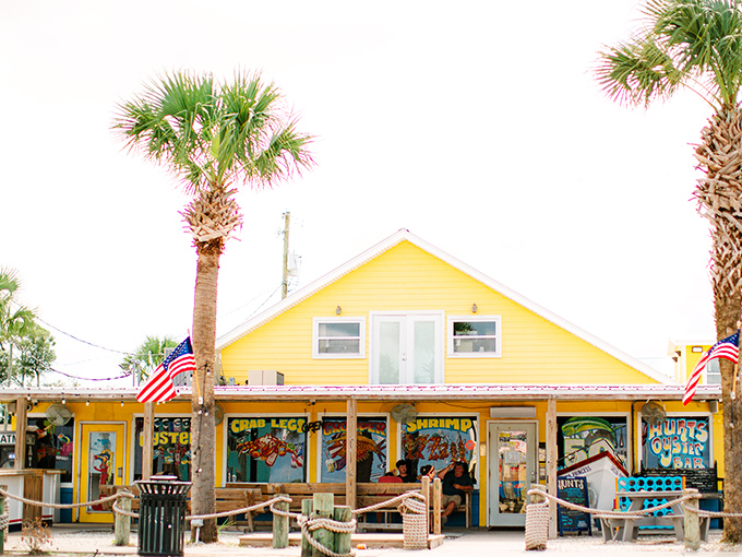 That sunshine-yellow building isn't just a restaurant&mdash;it's Panama City's beacon of seafood salvation, standing proud among the palms like Florida's tastiest landmark.