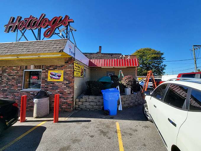 The unassuming brick exterior of Skyway Doghouse stands as a beacon to Chicago food pilgrims. That vintage "Hotdogs" sign has been guiding hungry souls for generations.