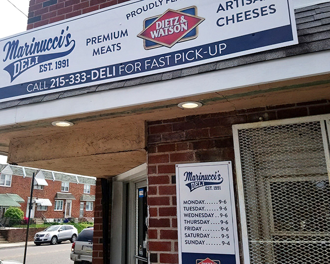 The unassuming brick storefront of Marinucci's Deli stands like a culinary lighthouse in Mayfair, beckoning sandwich enthusiasts with its no-nonsense charm.