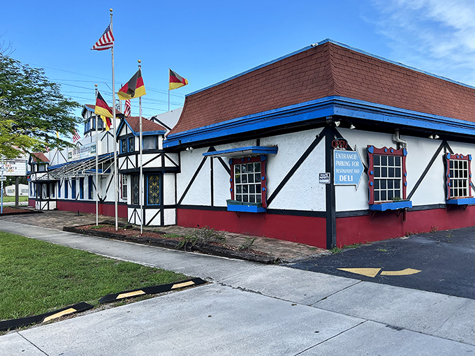 Bavaria meets Florida at Old Heidelberg's distinctive Tudor-style exterior. German flags flutter alongside the Stars and Stripes, promising authentic European flavors in Fort Lauderdale.