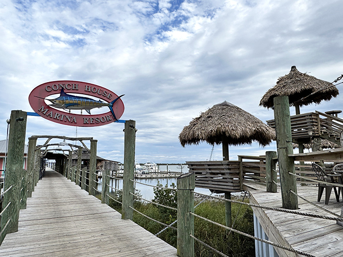 The entrance to paradise isn't pearly gates&mdash;it's a weathered boardwalk beneath a marlin sign, promising Caribbean flavors just steps away.