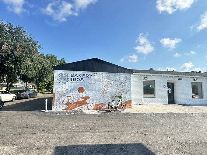 The unassuming exterior of Bakery 1908 proves once again that culinary treasures often hide in plain sight. That mural hints at delicious secrets within.