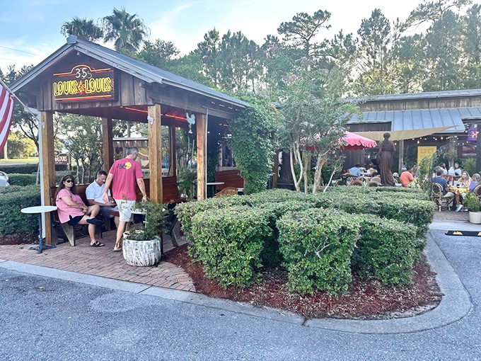 Like a tropical cabin of culinary delights, Louis Louis beckons with its rustic wooden charm and those unmistakable bright yellow doors that practically shout "good times ahead!"