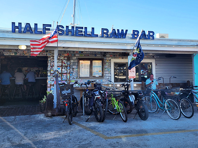 The iconic blue sign beckons seafood lovers like a siren call, while bicycles out front hint at the laid-back Key West lifestyle awaiting inside.