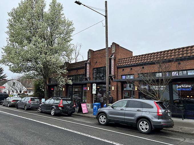 The brick fa&ccedil;ade of Cadillac Caf&eacute; stands proudly on a sunny Portland day, promising breakfast delights behind those welcoming doors.