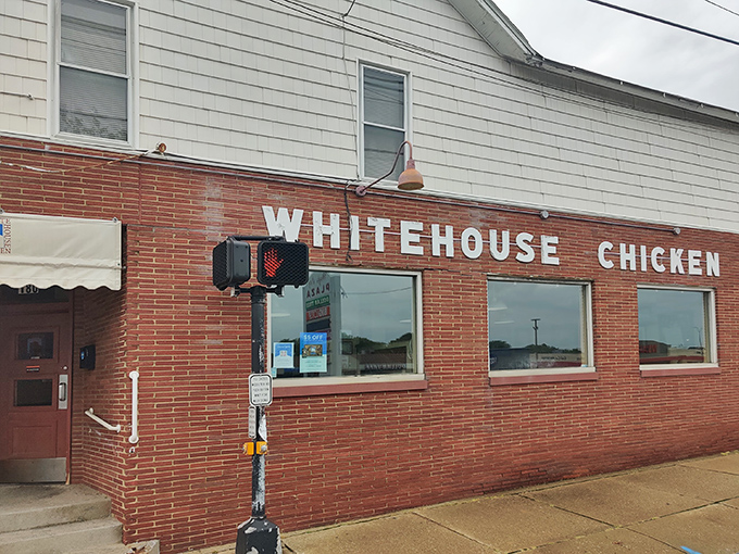 The unassuming brick exterior of White House Chicken in Barberton hides culinary greatness within. Like finding a Michelin star in your neighbor's garage.