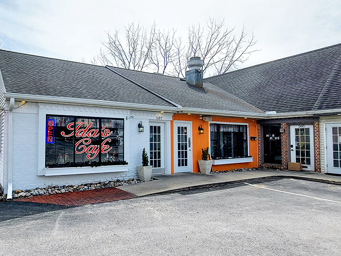 The bright orange door at Ida's Cafe isn't just an entrance&mdash;it's an invitation to breakfast paradise in Lancaster's cozy countryside.