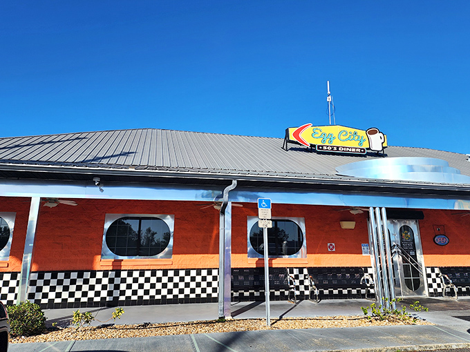 The bright orange exterior with porthole windows isn't just eye-catching&mdash;it's a time portal to the 1950s waiting in Haines City. No DeLorean required.