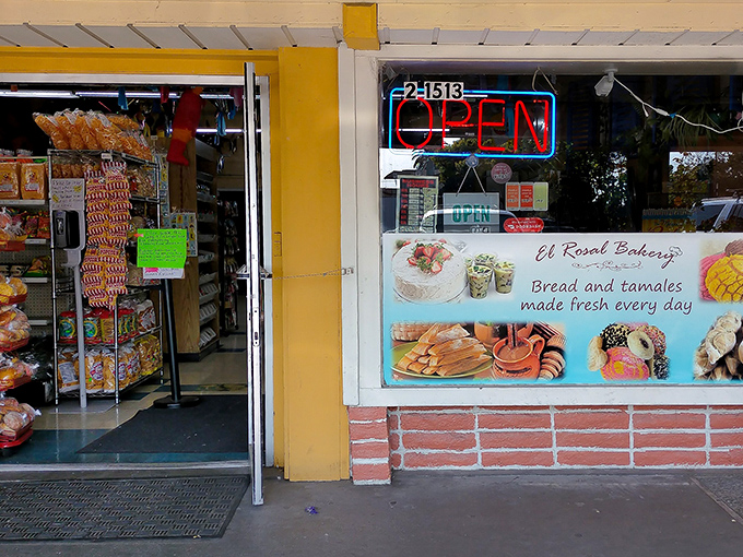 The bright yellow facade of El Rosal Bakery isn't just a building—it's a portal to flavor paradise. "Bread and tamales made fresh every day" isn't just a promise, it's a way of life.