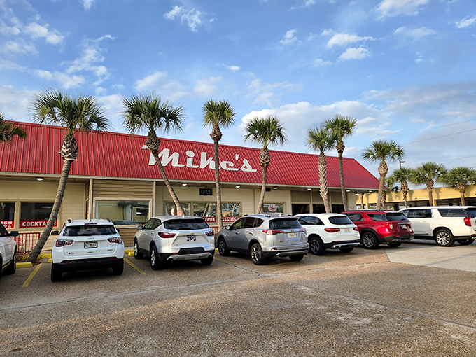 Mike's distinctive red roof beckons seafood lovers like a lighthouse for the hungry. This unassuming Panama City Beach landmark promises treasures within.