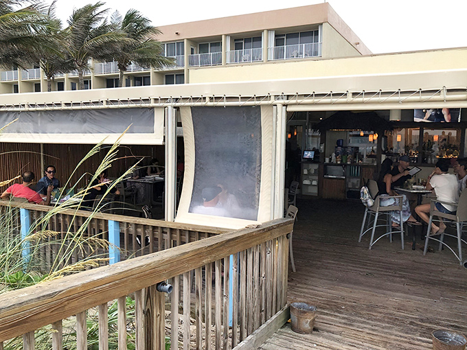 The beachside entrance to Shuckers welcomes diners with coastal charm and the promise of ocean breezes &ndash; Florida dining as it should be.