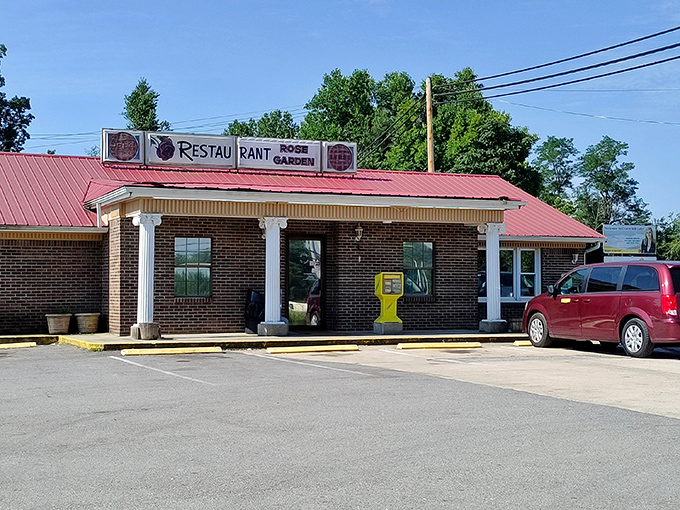 The unassuming brick exterior with its bright red roof is like finding a treasure chest disguised as a toolbox. Culinary magic happens inside!