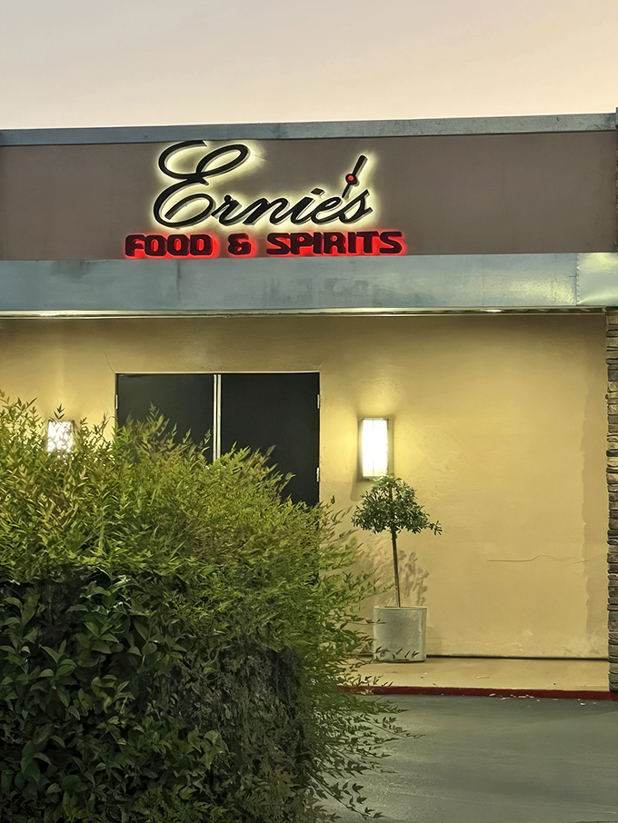 The understated entrance to Ernie's Food & Spirits belies the culinary magic happening inside. Like finding a secret passage to flavor paradise.