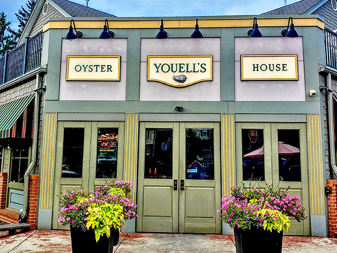 The sage green exterior of Youell's Oyster House beckons like a lighthouse for seafood lovers, promising oceanic treasures in the heart of Pennsylvania.