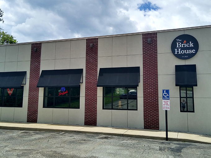 The unassuming exterior of Brick House Tap & Grill proves once again that culinary treasures often hide in plain sight.