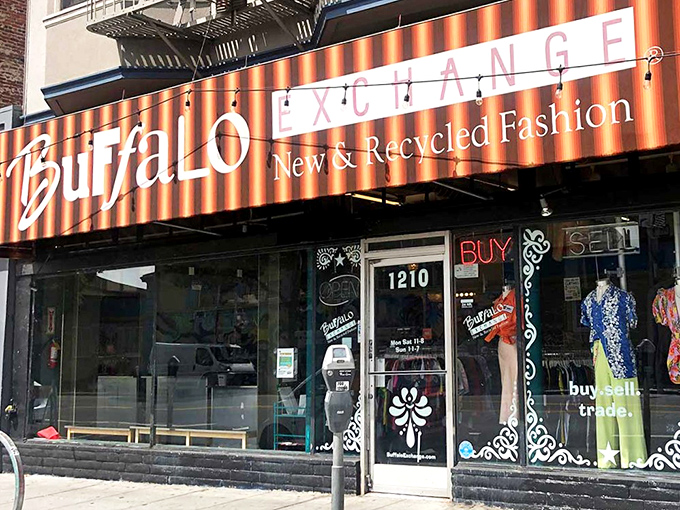 The iconic red-striped Buffalo Exchange storefront beckons fashion hunters like a beacon of sustainable style on Haight Street.