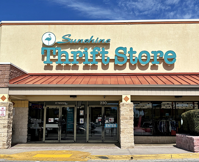 The turquoise sign beckons like a siren call to bargain hunters. Sunshine Thrift's flamingo logo perfectly captures Florida's thrifty paradise vibe.