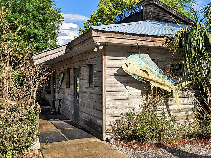 Don't judge this seafood sanctuary by its weathered exterior. Like a Florida fisherman's secret hideaway, Blue Water Bay's rustic charm is just the beginning of the story.