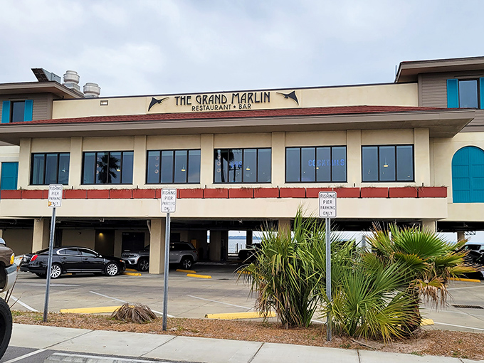 The Grand Marlin stands proudly on Pensacola Beach, its unassuming exterior hiding culinary treasures within. Like a good poker player, it keeps its best cards close.