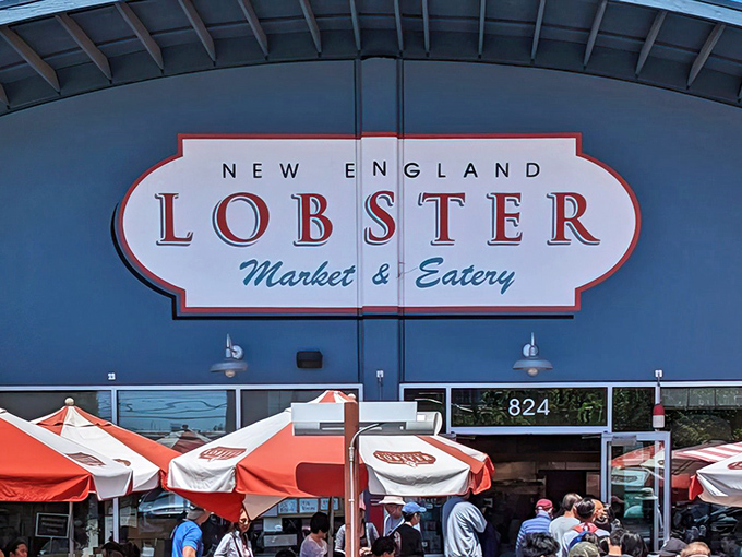 The blue building with its bold red "LOBSTER" sign stands like a maritime beacon in Burlingame's industrial landscape, promising seafood salvation just minutes from SFO.