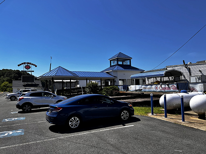 The iconic roadside sign beckons like a siren call to seafood lovers &ndash; Captain Billy's stands ready to welcome hungry travelers to crab paradise.