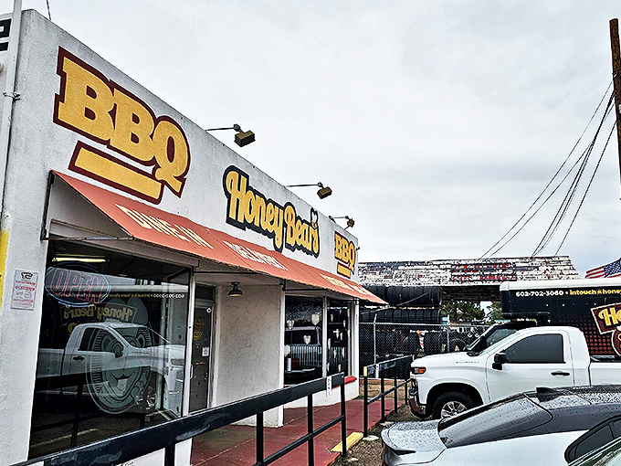 The unassuming yellow storefront of Honey Bear's BBQ stands like a beacon of smoky promise in the Phoenix sun.