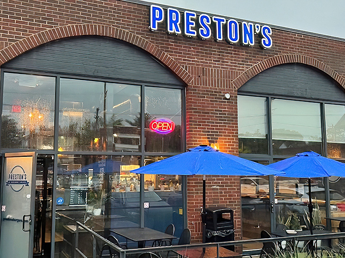 Preston's brick exterior with those signature blue umbrellas isn't just inviting&mdash;it's practically whispering "get in here and try these burgers already!"
