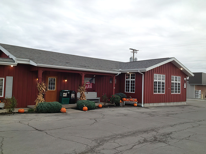 The Red Pig Inn's barn-red exterior isn't just a color choice&mdash;it's a promise of the smoky treasures waiting inside this unassuming Ottawa landmark.